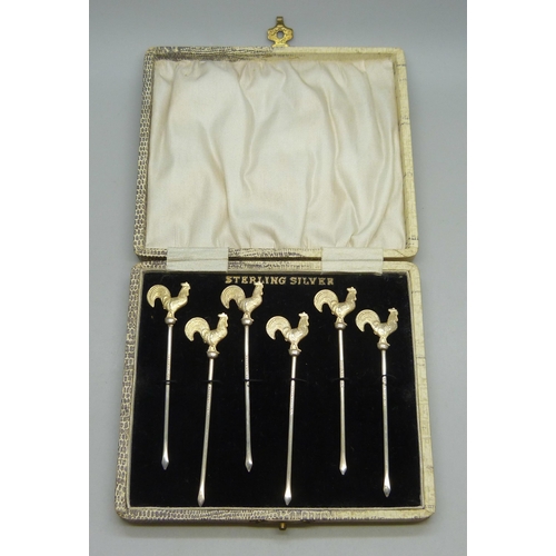 A set of sterling silver cocktail sticks in the form of cockerels, 23g ...