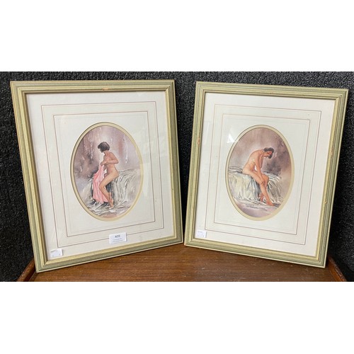 A pair of Kim Raymond limited edition prints of nude females, framed