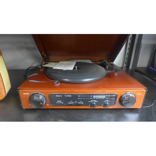 A vintage style Bush FM, MW, LW radio and a model EL-1699 turntable