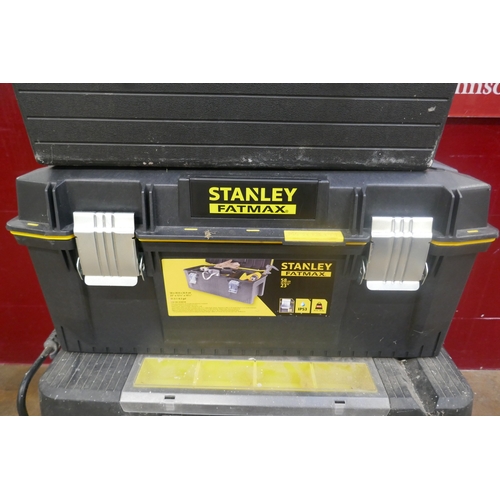 A Stanley mobile tool chest containing mixed tools and a Stanley Fatmax ...