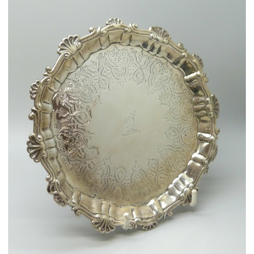 A George II silver salver with crest and engraved design, maker's mark ...