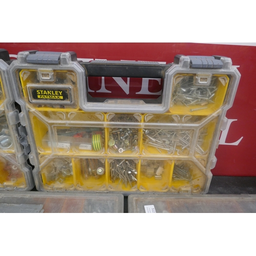 Two Stanley Fat-Max stacking organiser trays containing a large ...