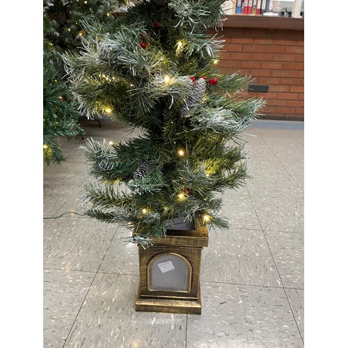A 3ft potted pre-lit Christmas tree