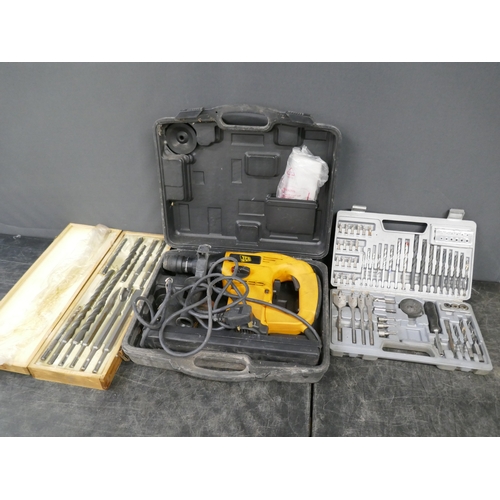 A JCB JCBD-RH D3 rotary hammer drill with a case of SDS drill bits and ...