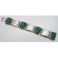 A Mexican Aztec style bracelet with carved green onyx and agate, 18cm l
