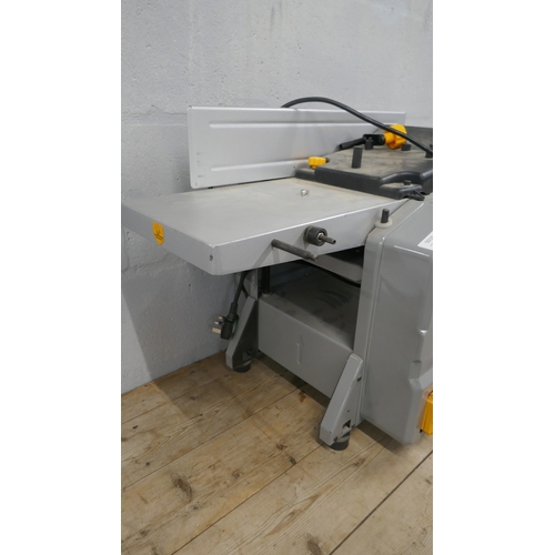 A Titan TTB579PLN, 220-240V, 1500W planer *This lot is subject to VAT