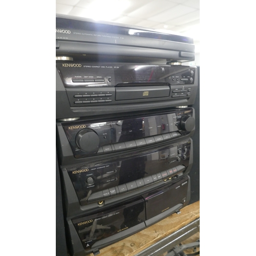 A Kenwood stacking Hi-Fi system with turntable and 2 speakers