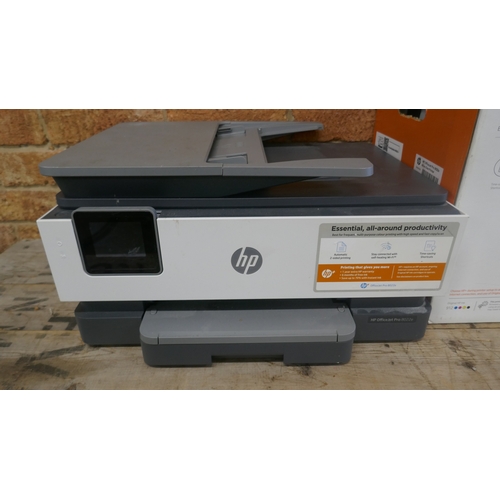 A boxed HP Office Jet Pro 8022E all in one printer and one other HP ...