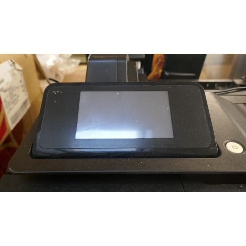 A HP Design Jet T120 E-Printer with assorted part full ink cartridges