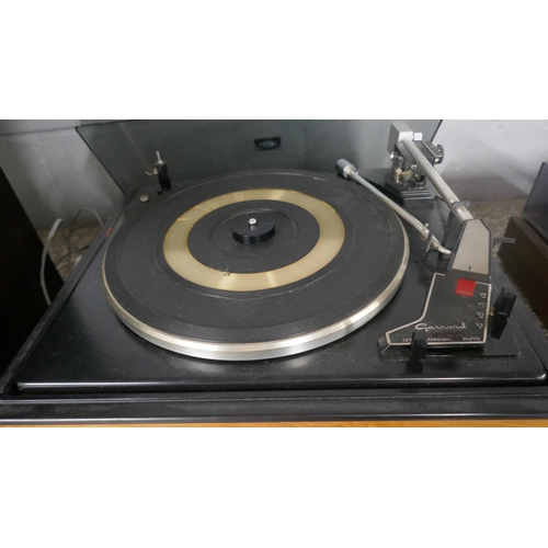 A Garrard SP25 turntable and a Metro sound amplifier and 2 Philips ...