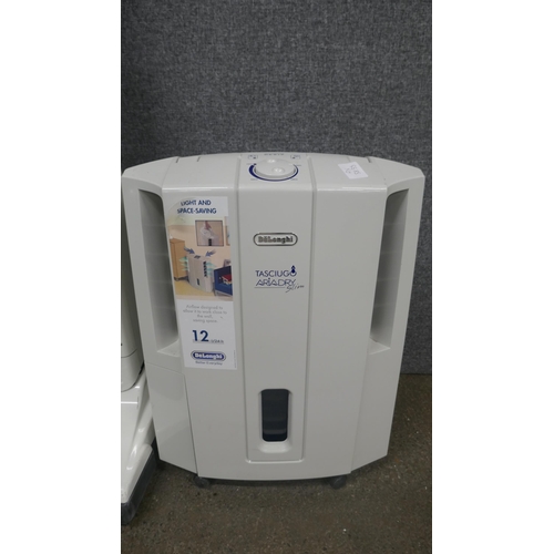 A Sebo Automatic X1.1 upright vacuum cleaner and a Tascrugo Delonghi ...