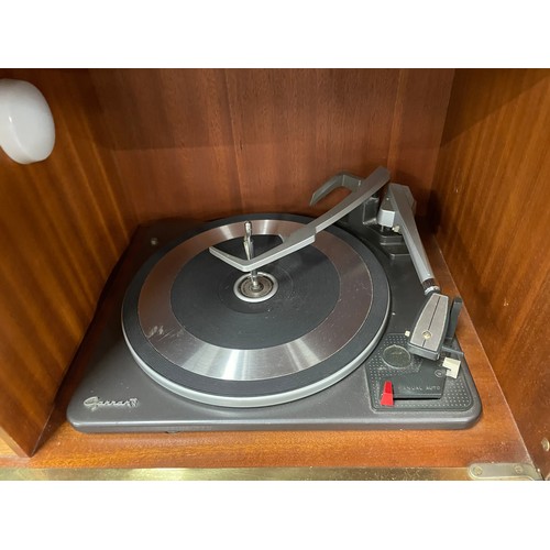 A Decca teak stereogram with a Garrard turntable
