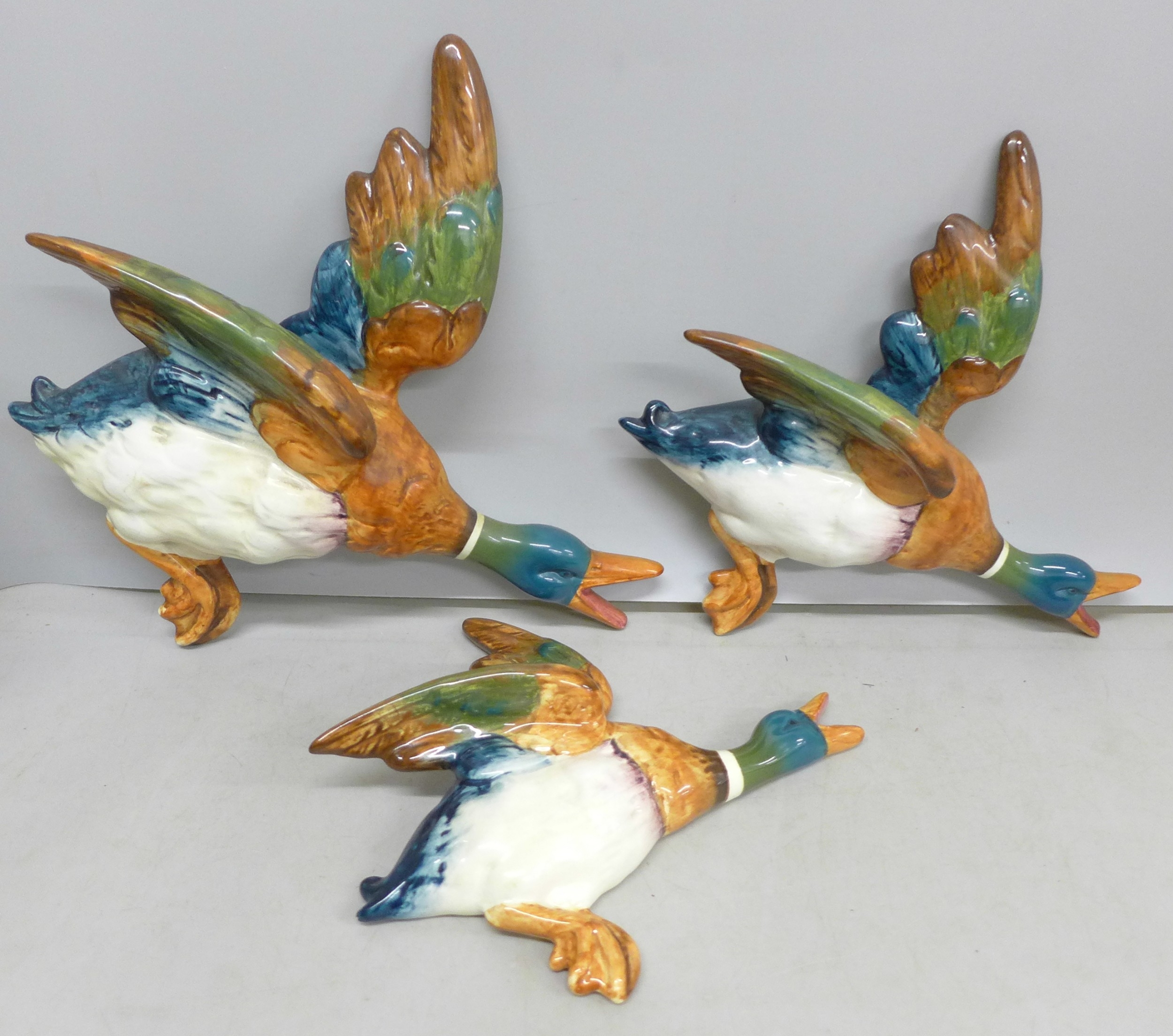 Three large Beswick graduated ceramic mallard duck wall plaques