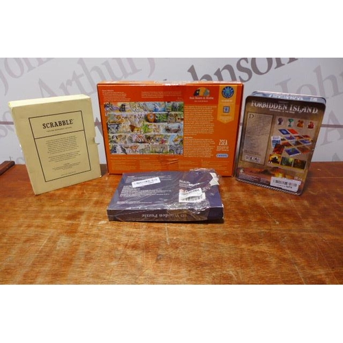 A Forbidden Island game, Endangered Animal jigsaw, Scrabble Crossword ...