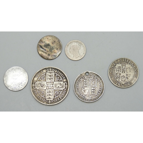 A collection of silver coins including Victorian