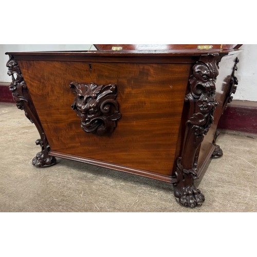 An Irish Regency carved mahogany cellarette
