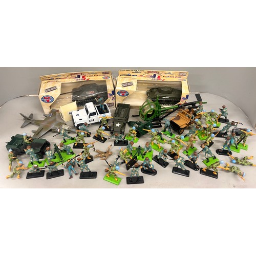 A collection of Britains Deetail model soldiers, Britains vehicles ...