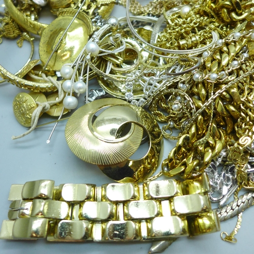 A collection of gold tone jewellery