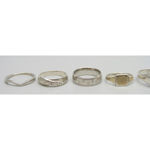 A collection of eight silver rings, 30g total
