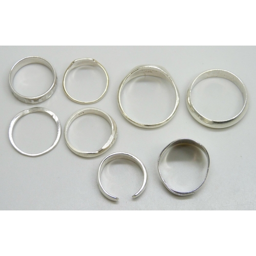 A collection of eight silver rings, 30g total