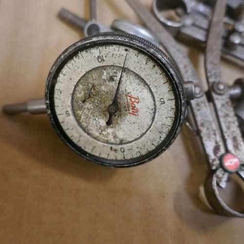 A quantity of assorted measuring devices such as micrometers, dial test ...
