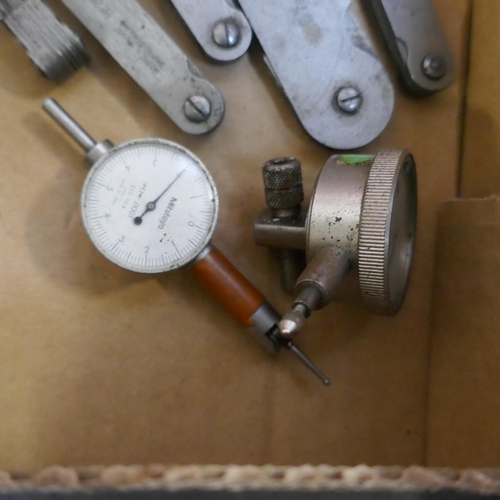 A quantity of assorted measuring devices such as micrometers, dial test ...