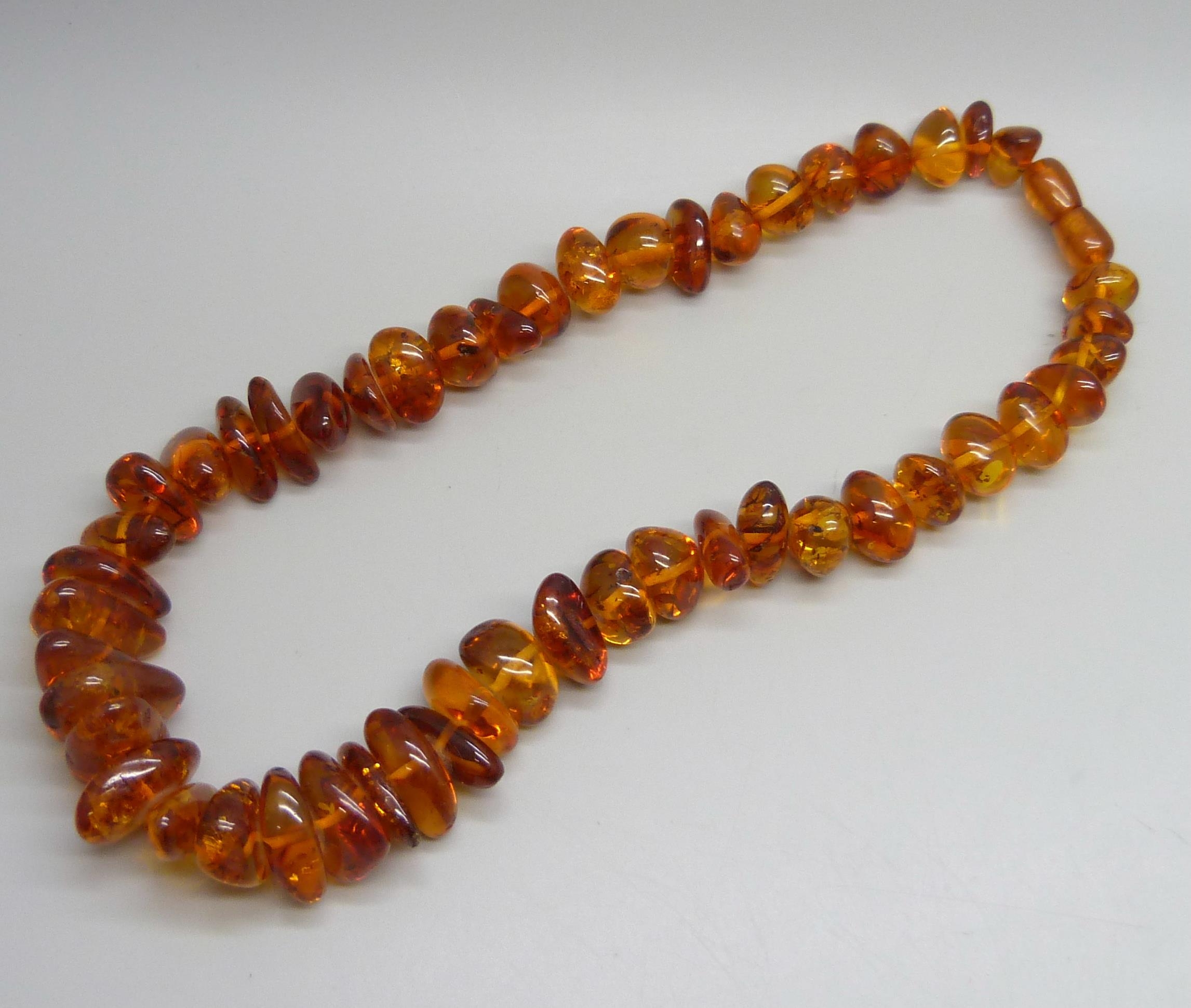A Baltic amber bead necklace, 60g, 45cm
