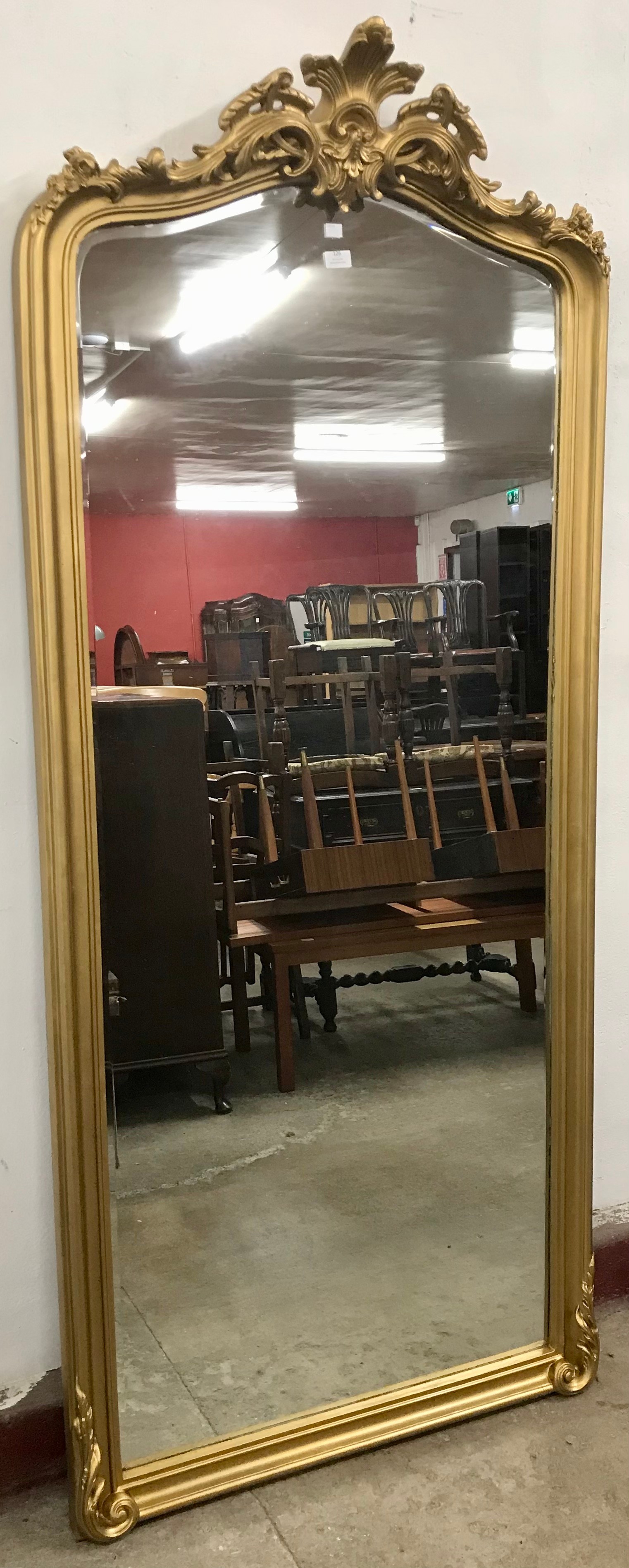 A French Rococo style gilt framed mirror
