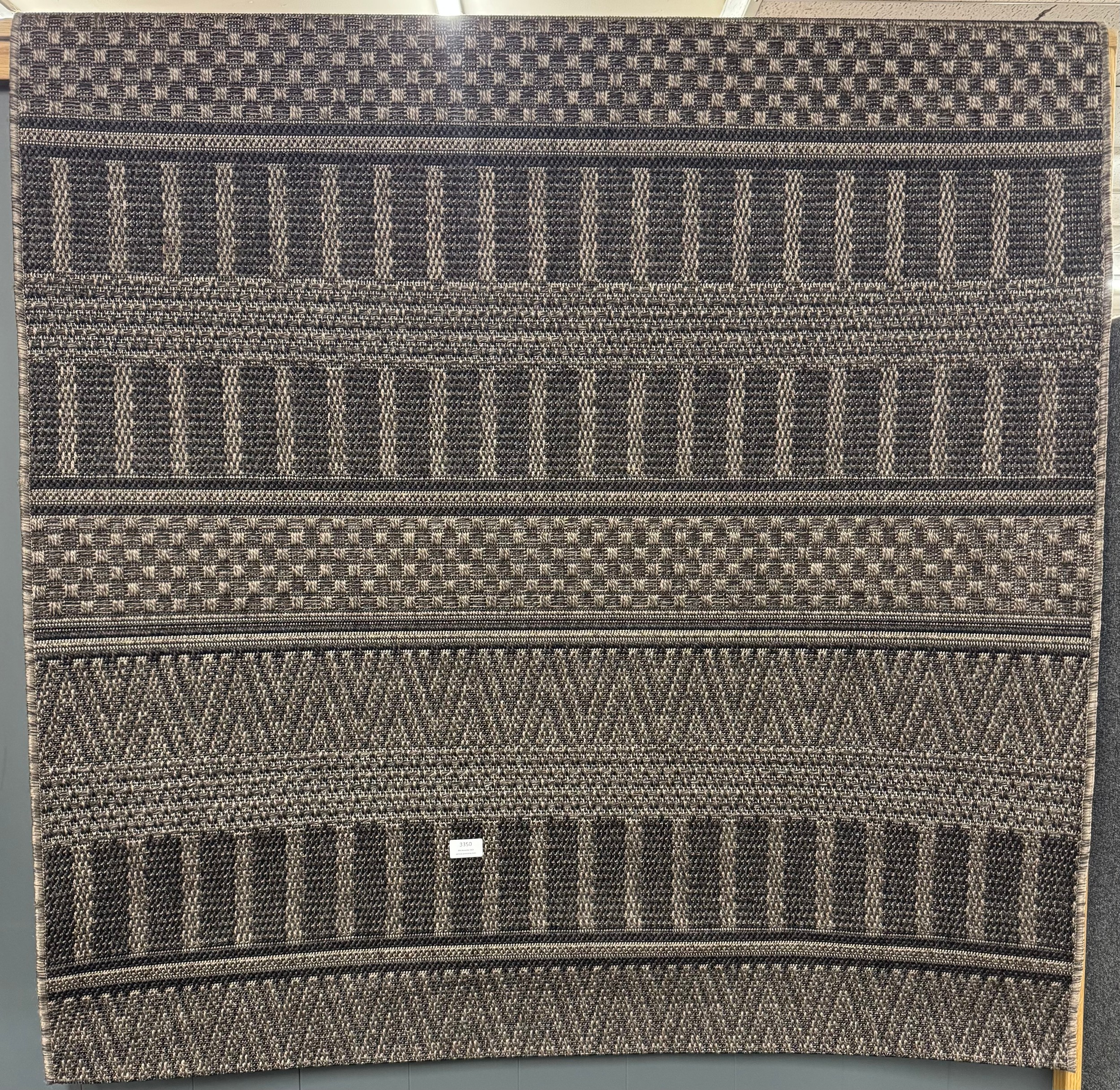 A brown all over patterned rug