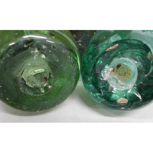 Five 19th century glass bottles and two Victorian glass dumps, bottles ...