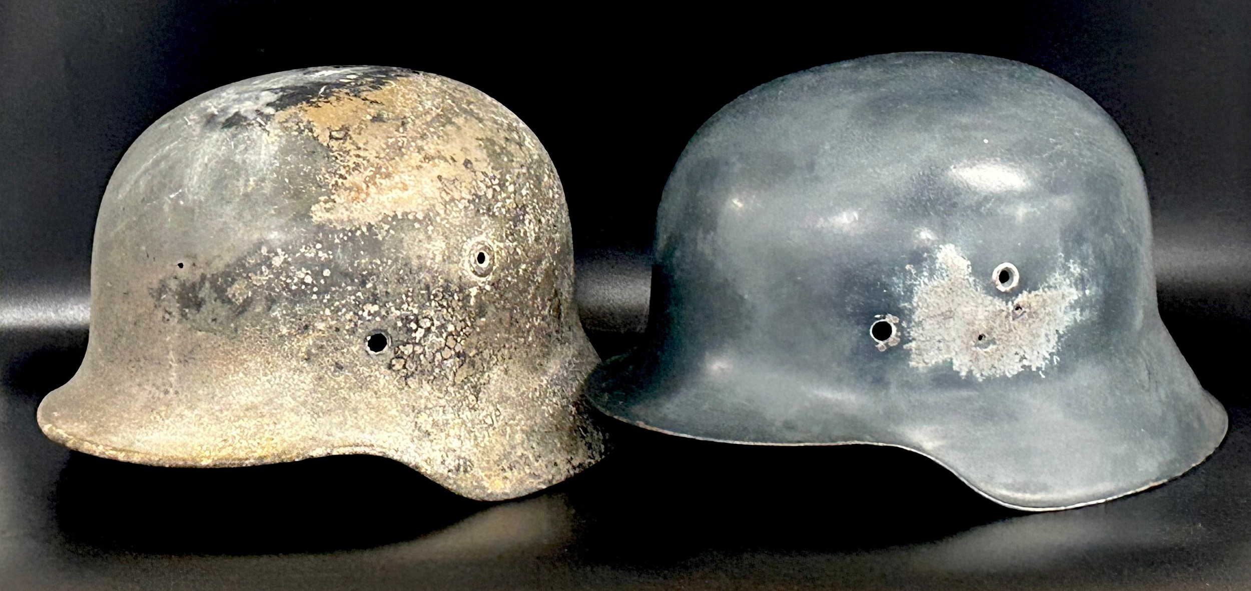 Two German World War II helmet shells