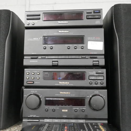 A Technics mini Hi-fi system with 2 speakers and remote