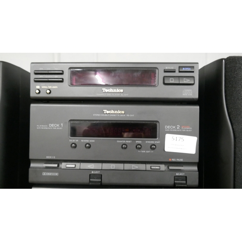 A Technics mini Hi-fi system with 2 speakers and remote