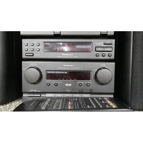 A Technics mini Hi-fi system with 2 speakers and remote
