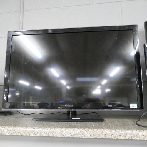 A Samsung UE24N4300 AE 24" television with remote and Panasonic TX ...