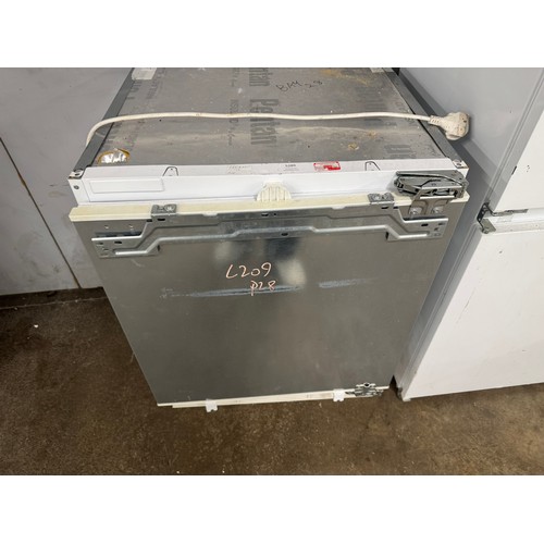 A Zanussi 60/40 integrated fridge freezer and a NEFF under counter ...
