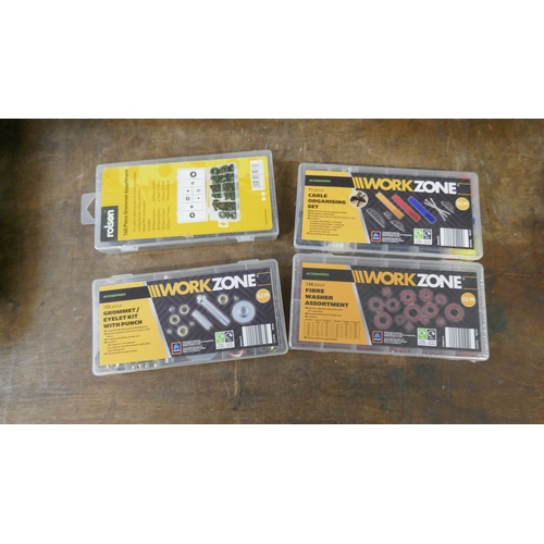 A Stanley Top Edge 61cm toolbox containing assorted tool kits including ...