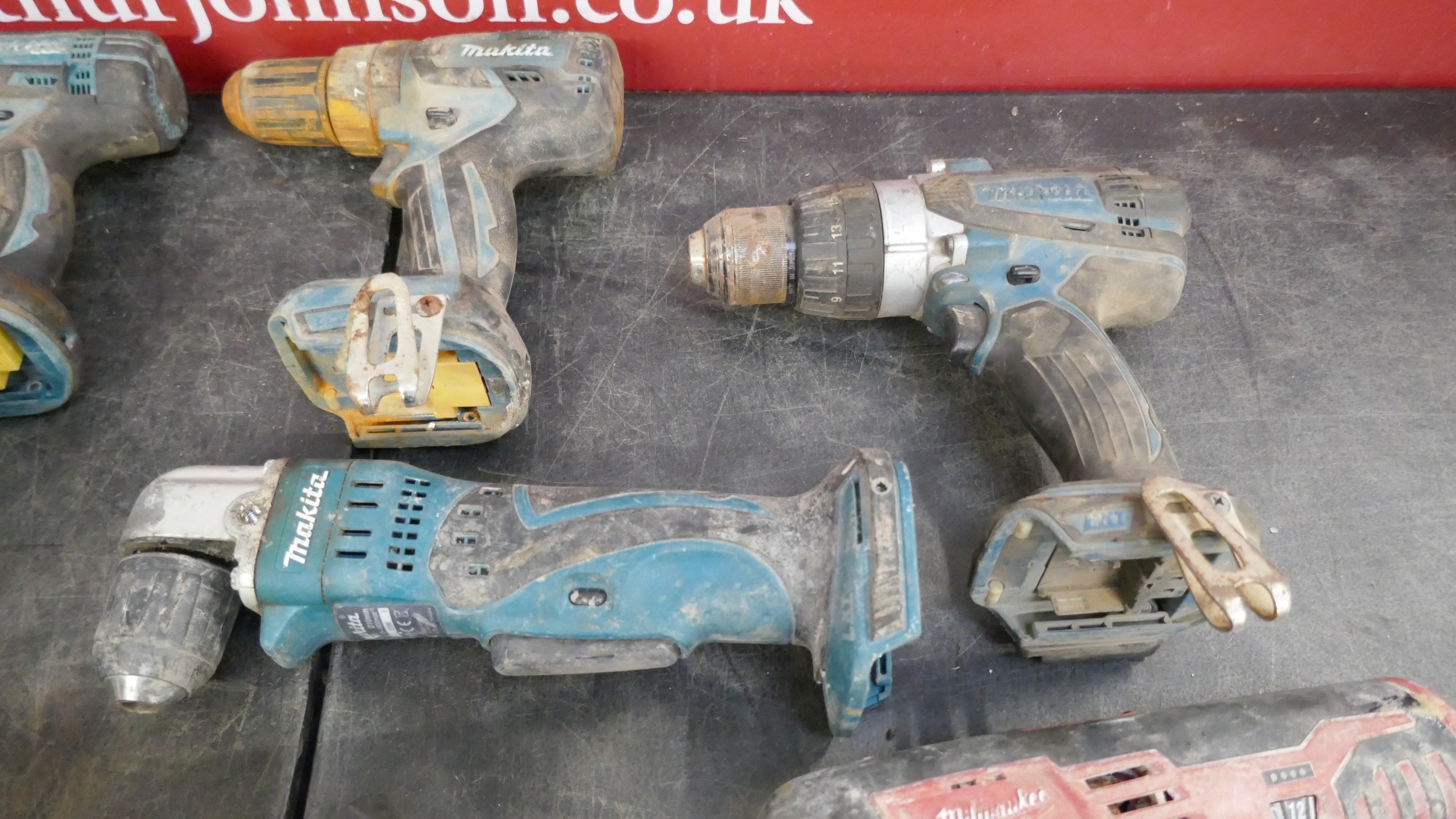 Assorted battery powered hand tools including Milwaukee 18v ...