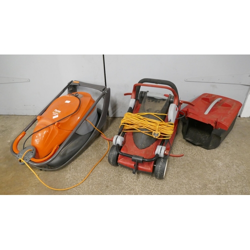 A Flymo Easy Glide 300V electric mower and a Toro 240V electric mower ...