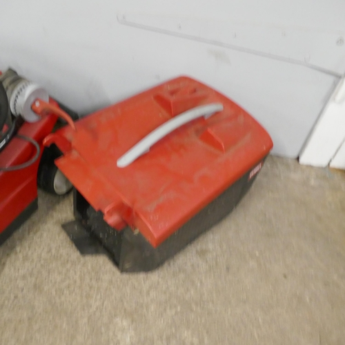 A Flymo Easy Glide 300V electric mower and a Toro 240V electric mower ...