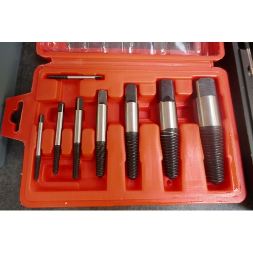 A 7 piece screw, bolt and stud extractor set, a 53 piece socket wrench ...