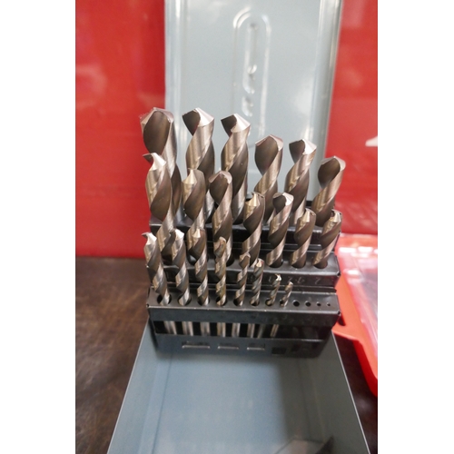 A 7 piece screw, bolt and stud extractor set, a 53 piece socket wrench ...