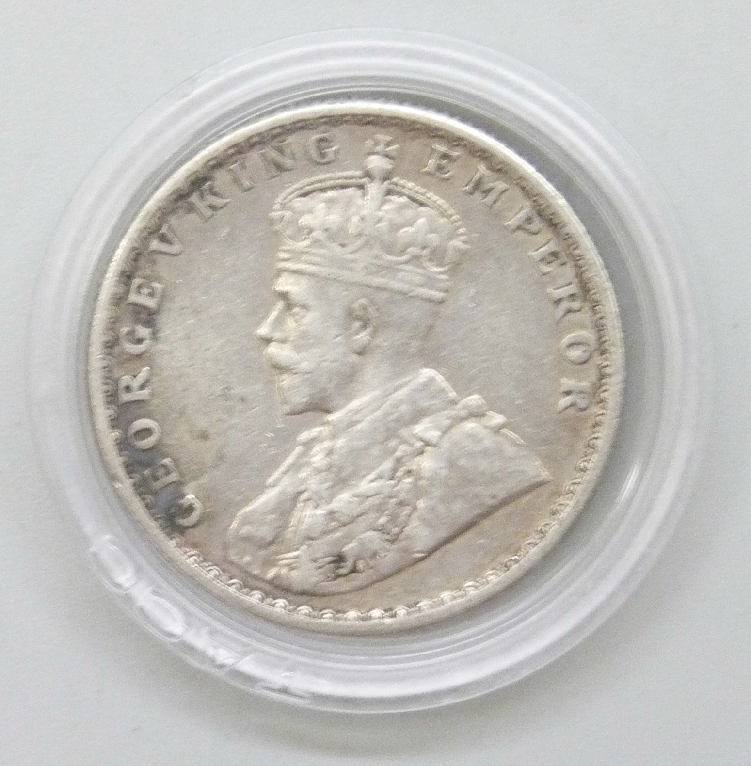 Coins - a George V 1914 silver half rupee, robed crown left