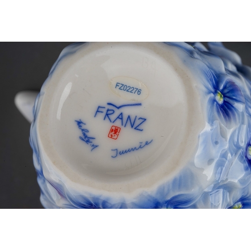 A Franz three piece china tea service in blue Hydrangea floral bouquet ...