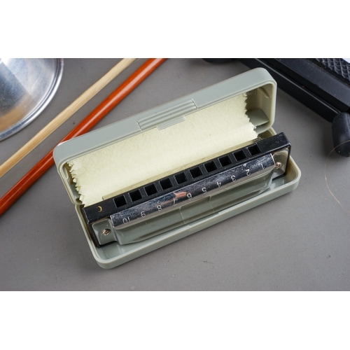 Assorted musical instruments to include: 1. an Ozark mandolin, in ...