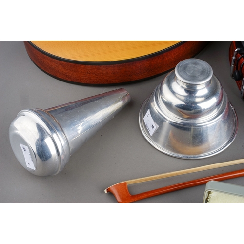 Assorted musical instruments to include: 1. an Ozark mandolin, in ...