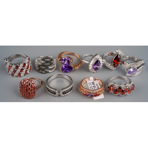 10 Rhodium plated dress rings set with semiprecious stones
