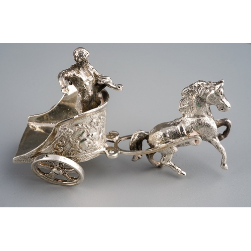 A Modern silver model of a Roman horse drawn chariot with figure, the ...