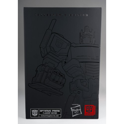 A boxed Robeson Optimus Prime Transformer robot, box contents appear to ...