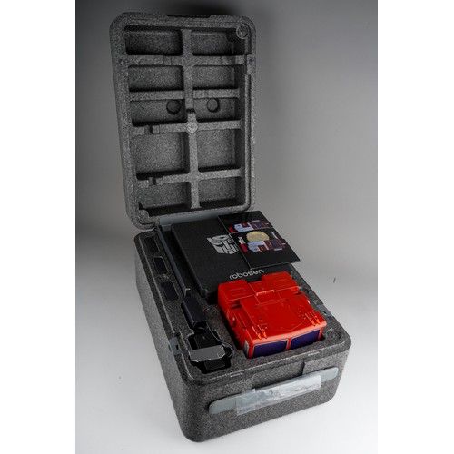 A boxed Robeson Optimus Prime Transformer robot, box contents appear to ...